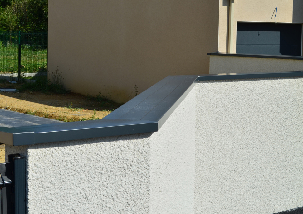 Pose de couvertines en aluminium et de boîtes à eau à Orthez