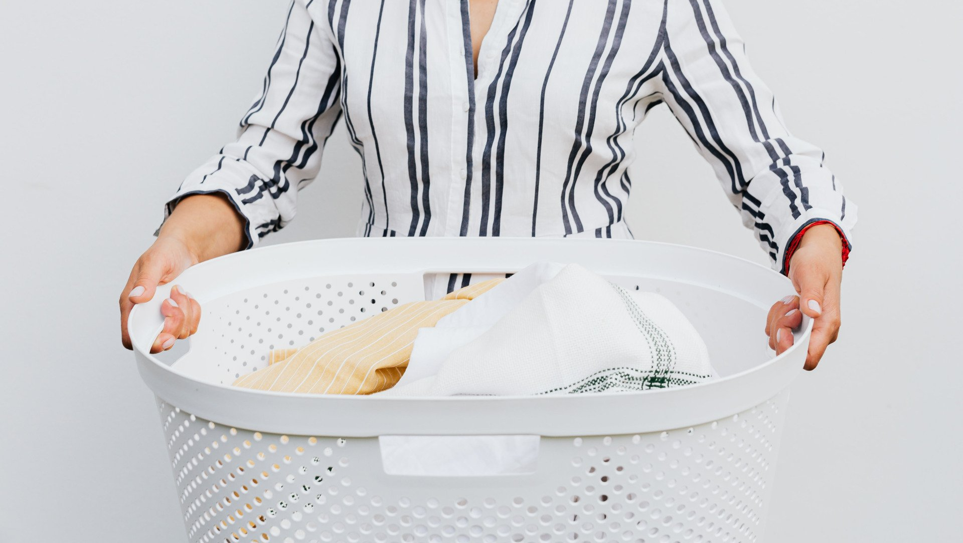 Réalisation des lessives et service de repassage à domicile